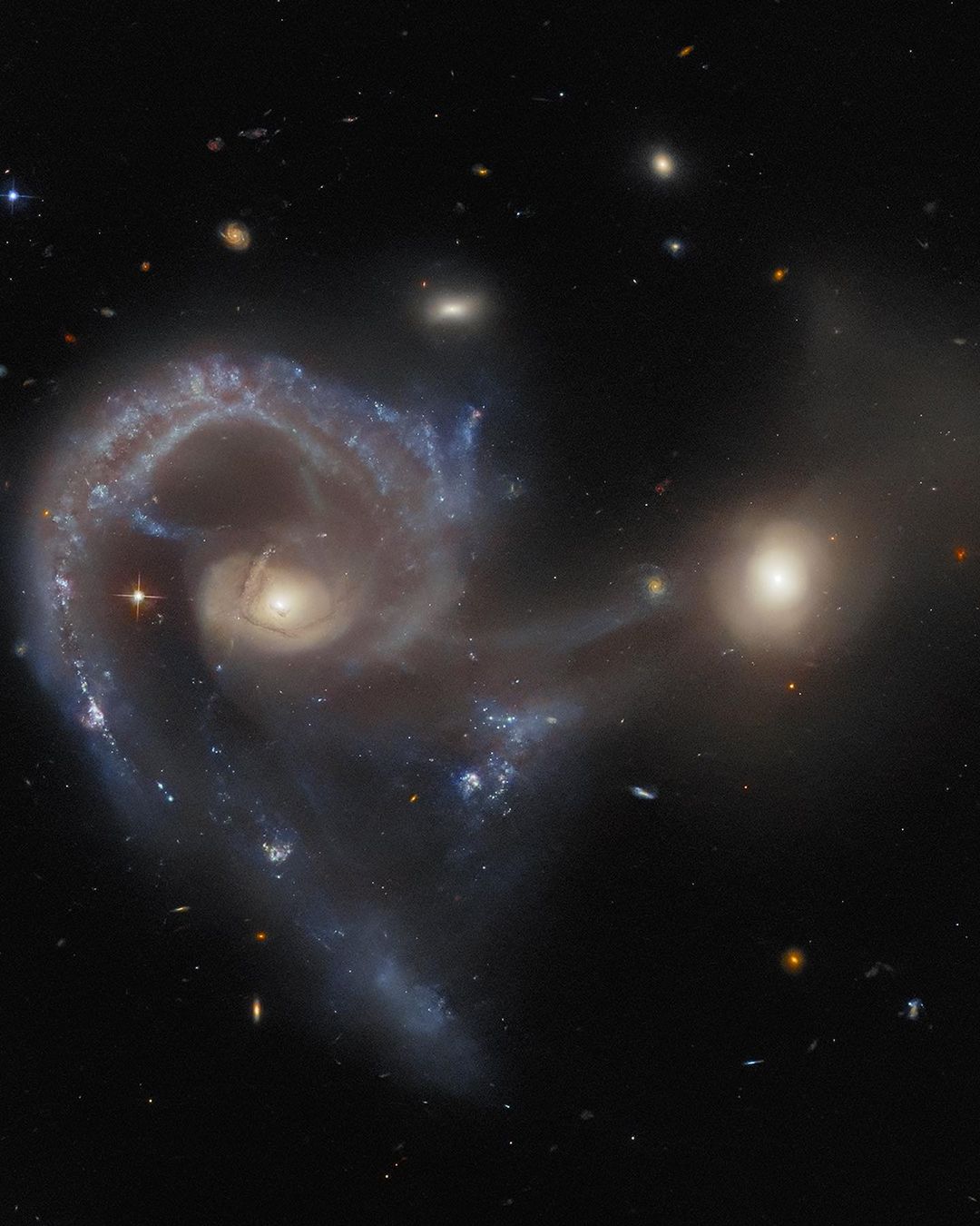 europeanspaceagency@instagram on Pinno: Hubble time! 🌌 Arp 107, a ...
