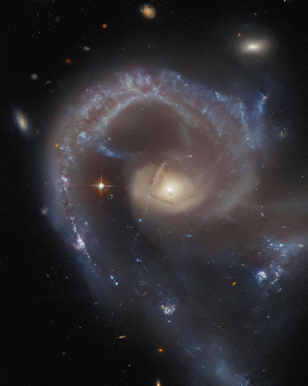 europeanspaceagency@instagram on Pinno: Hubble time! 🌌 Arp 107, a ...